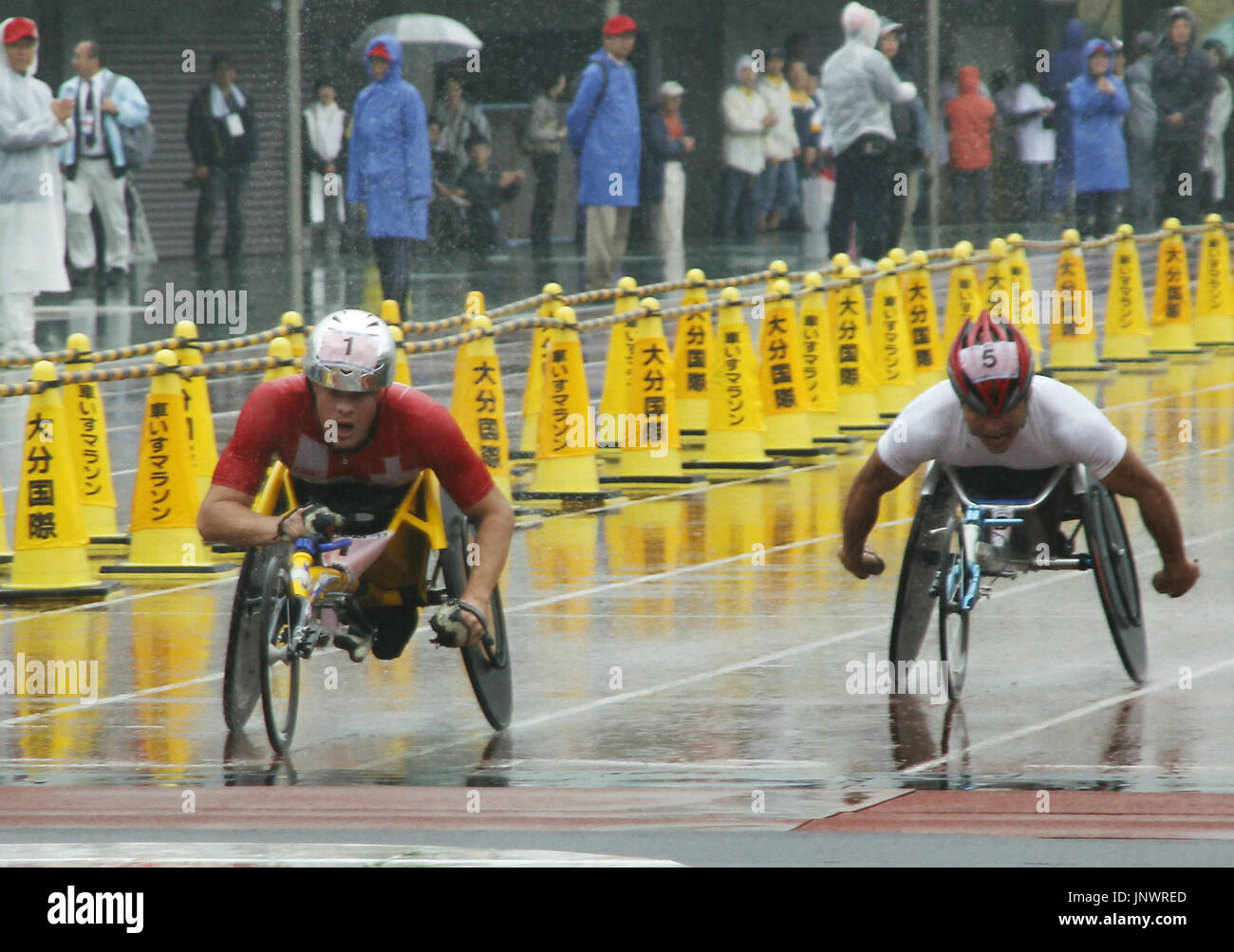 OITA, Japan - Marcel Hug of Switzerland (L) and Japan's Masayuki ...