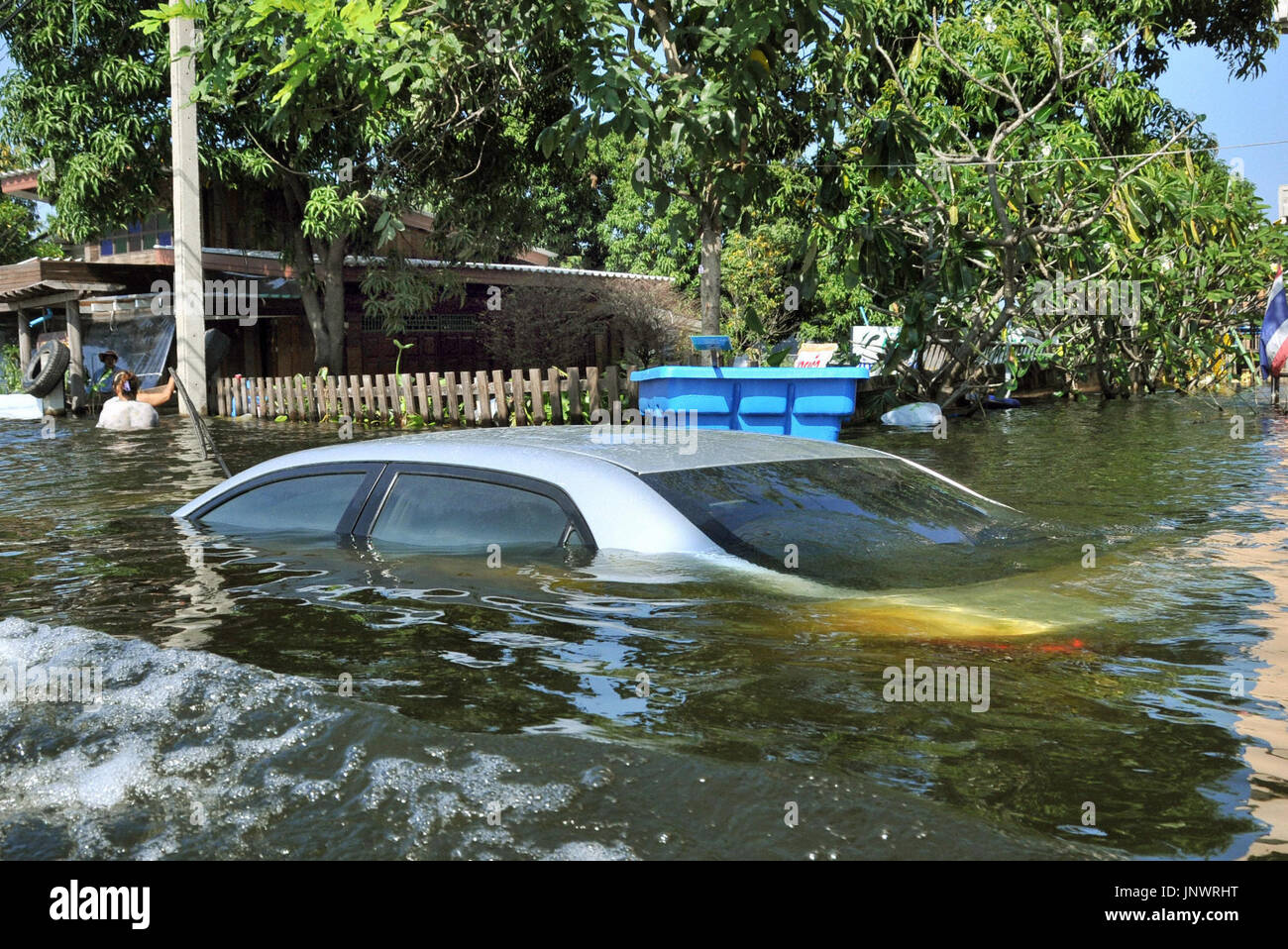 BANGBUATONG, Thailand - Photo shows a submerged car in the flood-hit ...