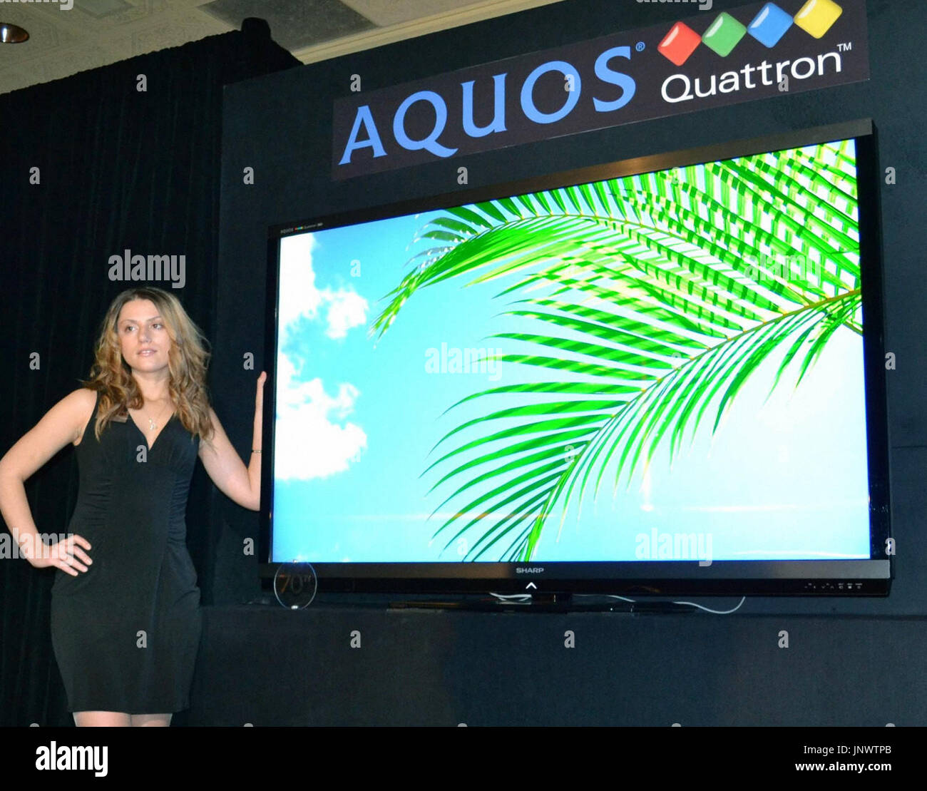 LAS VEGAS, United States - A presenter unveils a 70-inch liquid crystal ...
