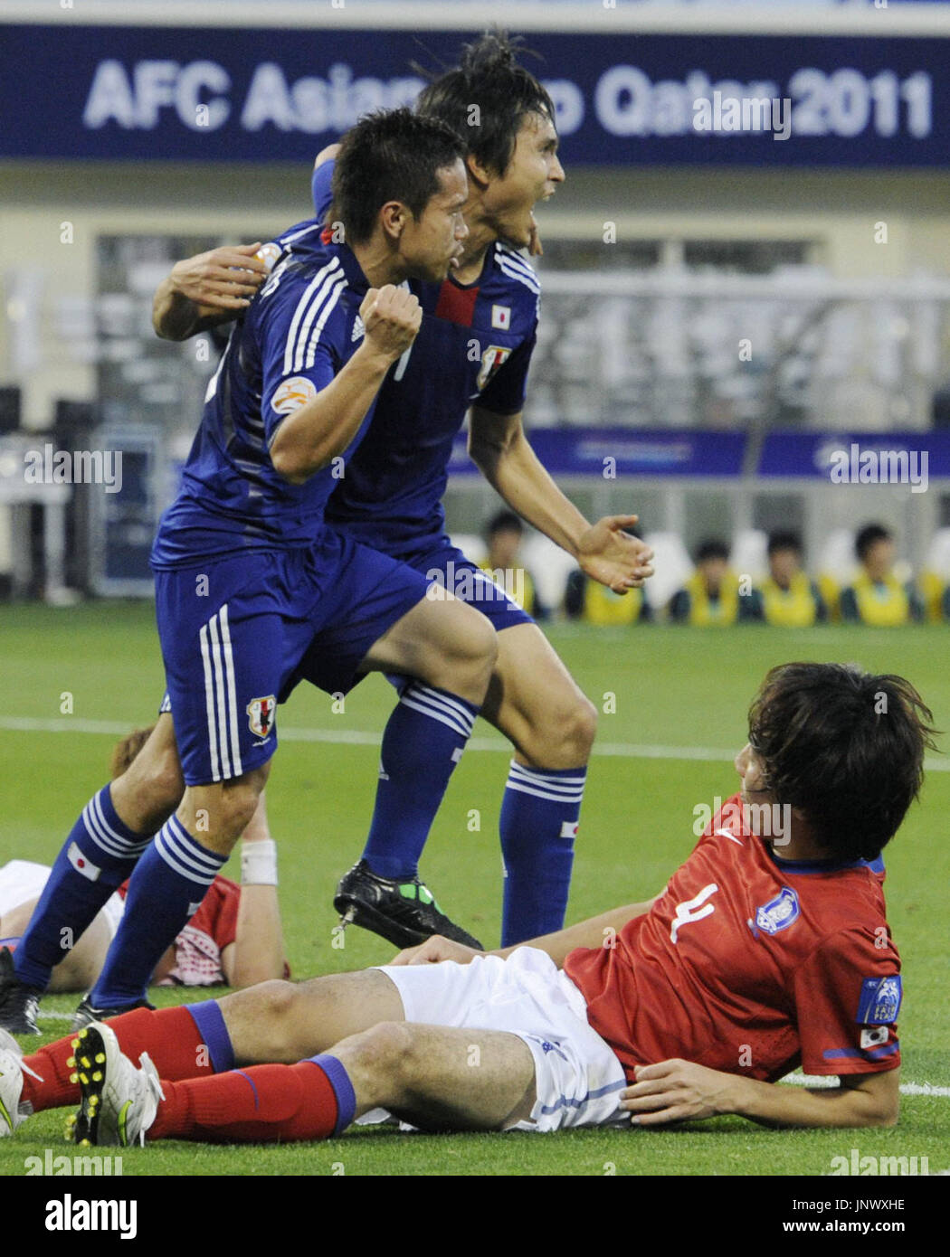 DOHA, Qatar - Japan's Ryoichi Maeda (R) and Yuto Nagatomo (L) celebrate Maeda's goal during the ...