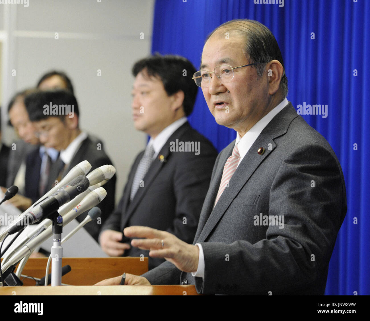 TOKYO, Japan - Japanese health minister Ritsuo Hosokawa announces the ...