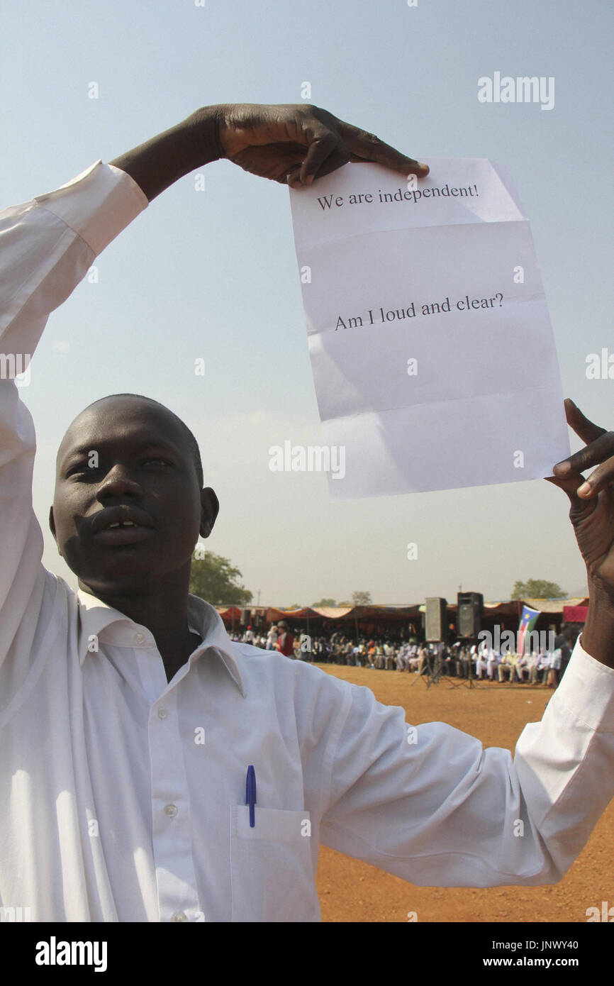 JUBA, Sudan - A man holds paper reading ''We are independent'' in Juba ...