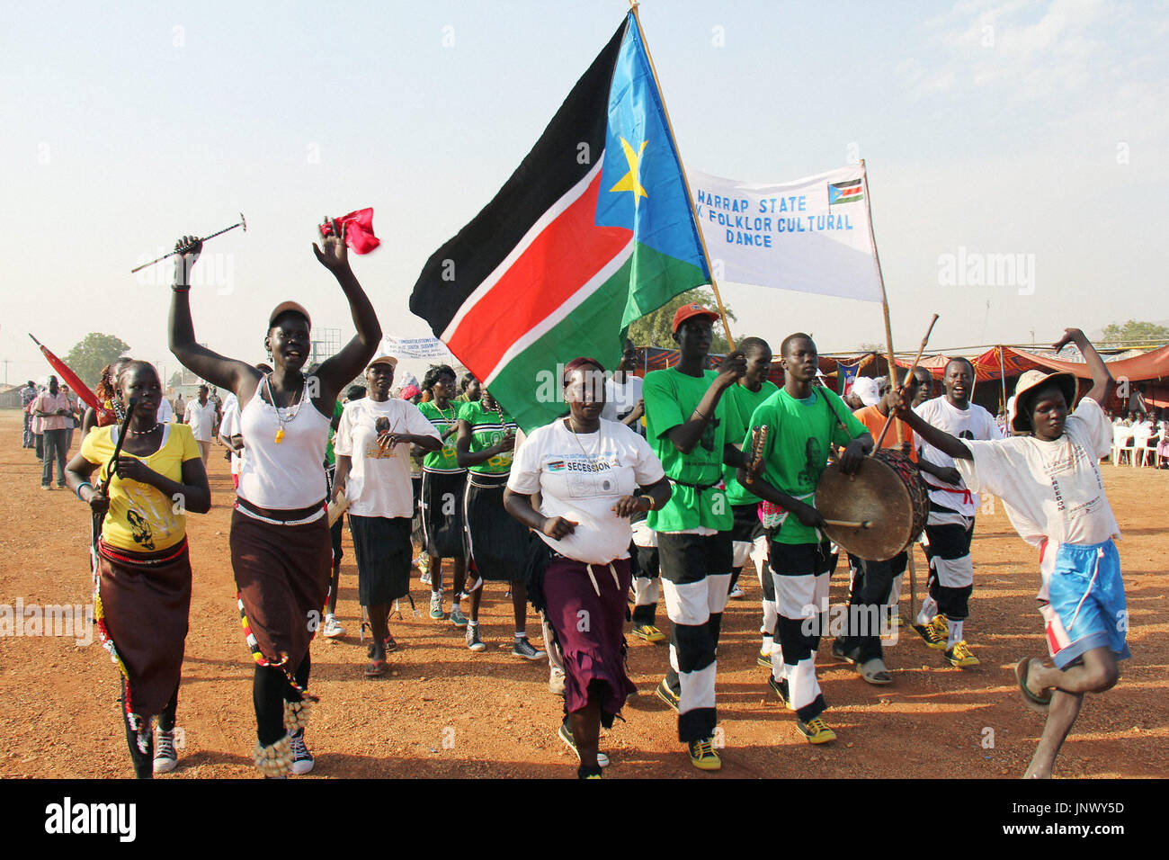 JUBA, Sudan - People holding the flag of the Southern Sudan authority ...