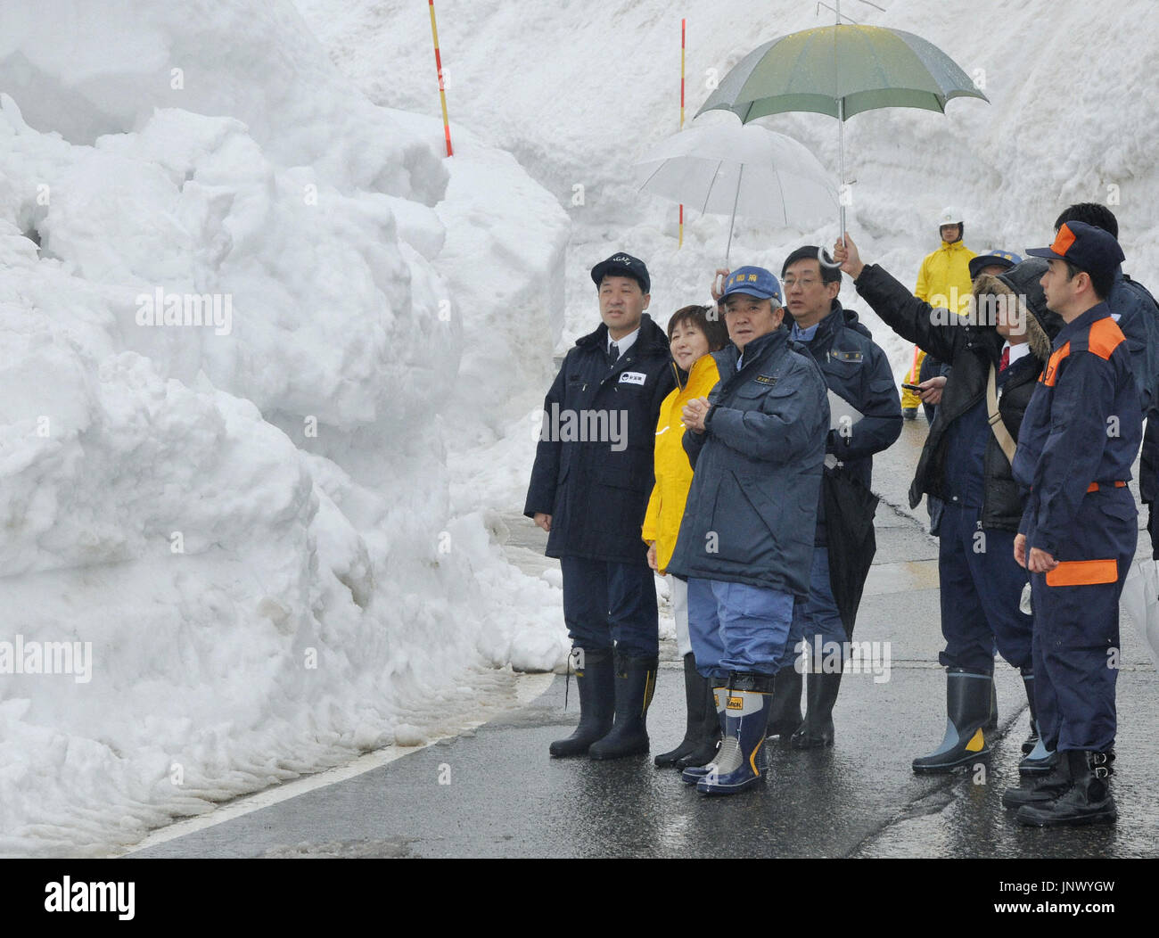 UONUMA, Japan - Disaster prevention minister Ryu Matsumoto (3rd from L ...
