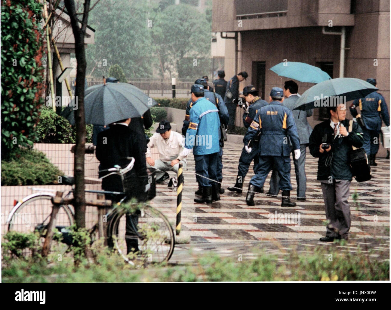 TOKYO, Japan - File photo shows police officers investigating at the ...