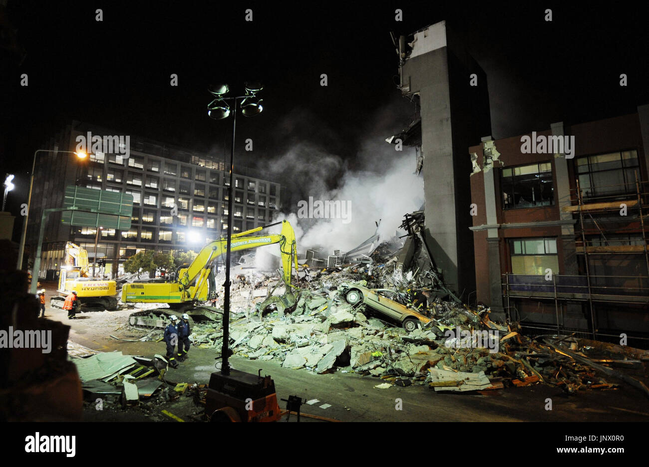 CHRISTCHURCH, New Zealand - Rescue efforts continue around a collapsed ...