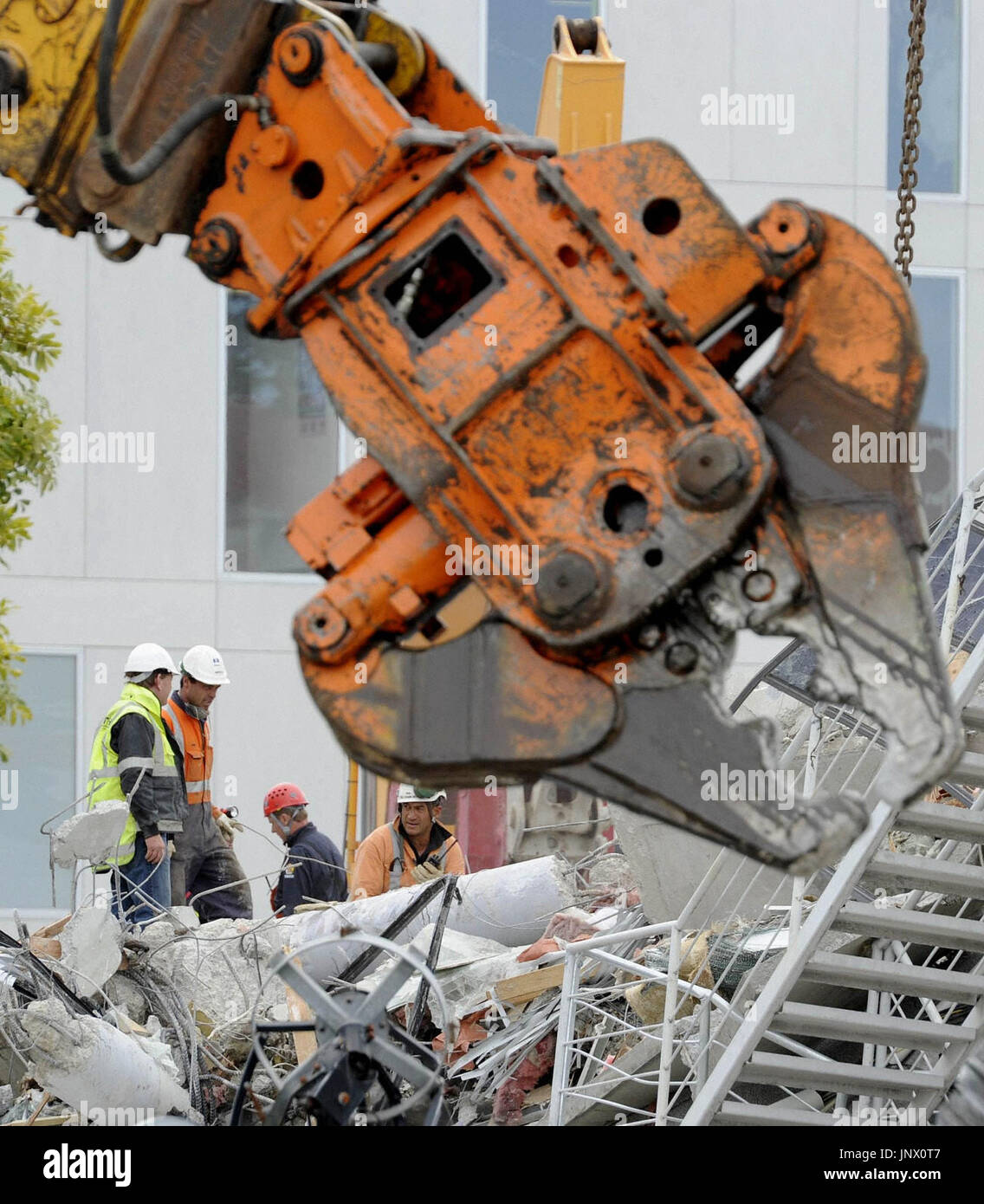 CHRISTCHURCH, New Zealand - Rescue workers search through the rubble of ...