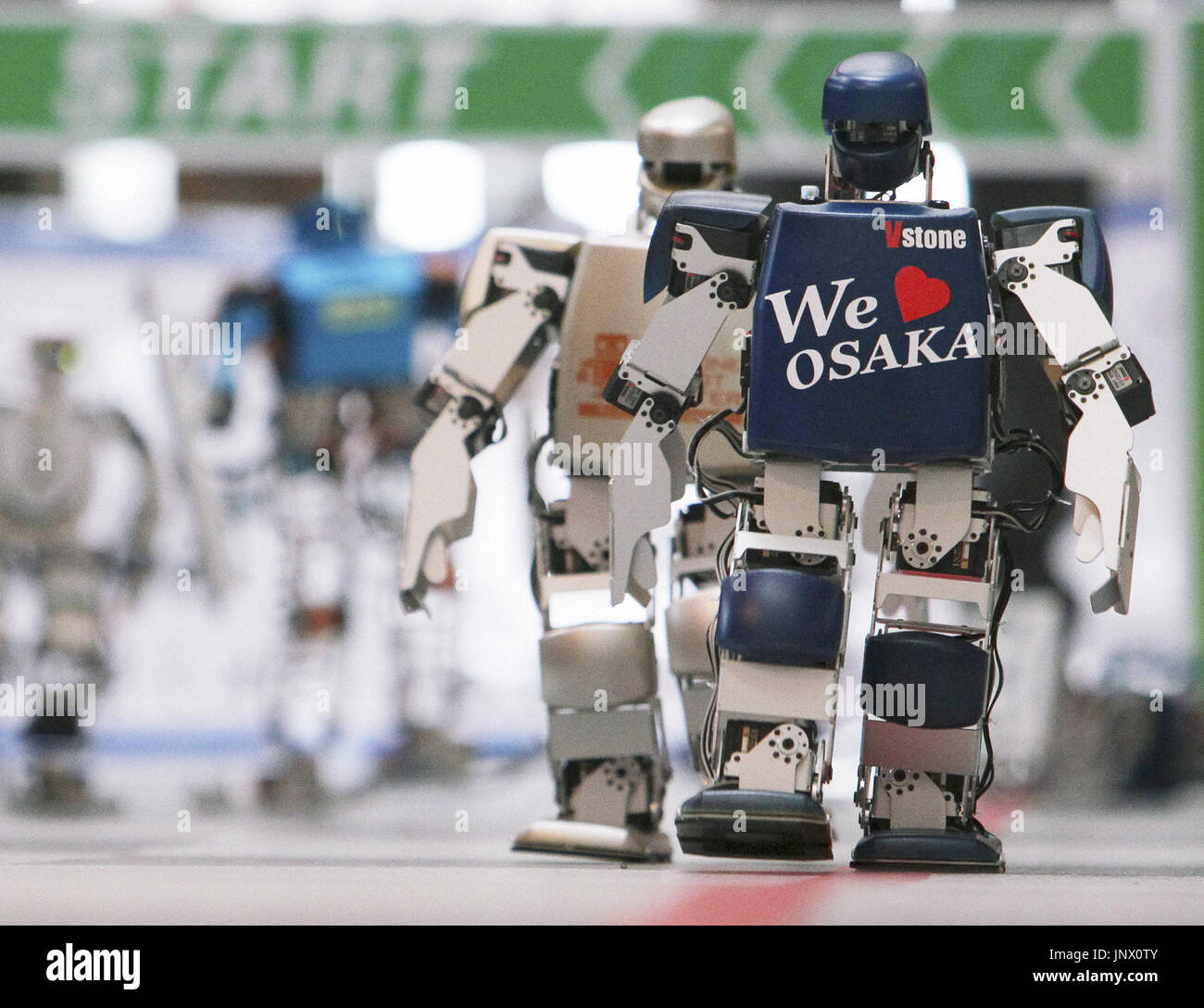 OSAKA, Japan - Biped robots take part in a full marathon, aiming to ...