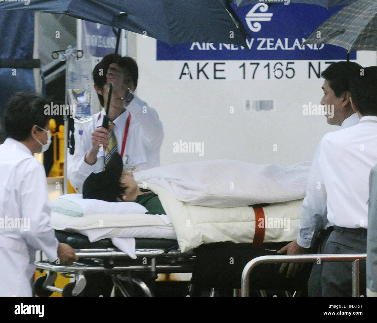 TOKYO, Japan - Kento Okuda (C on the stretcher), a 19-year-old Toyama ...