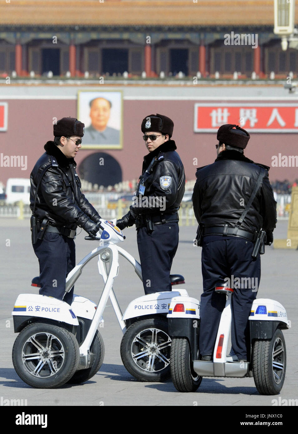 BEIJING, China - Chinese police officers patrol on Tiananmen Square in ...