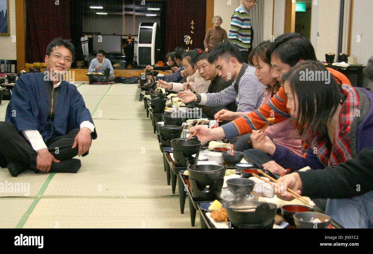 KOFU, Japan - Chinese tourists have dinner at a banquet room at a ...