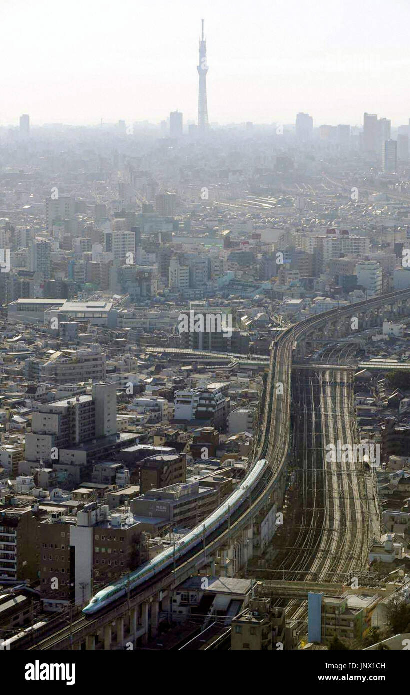 TOKYO, Japan - The new Hayabusa bullet train heads for JR Tokyo Station ...