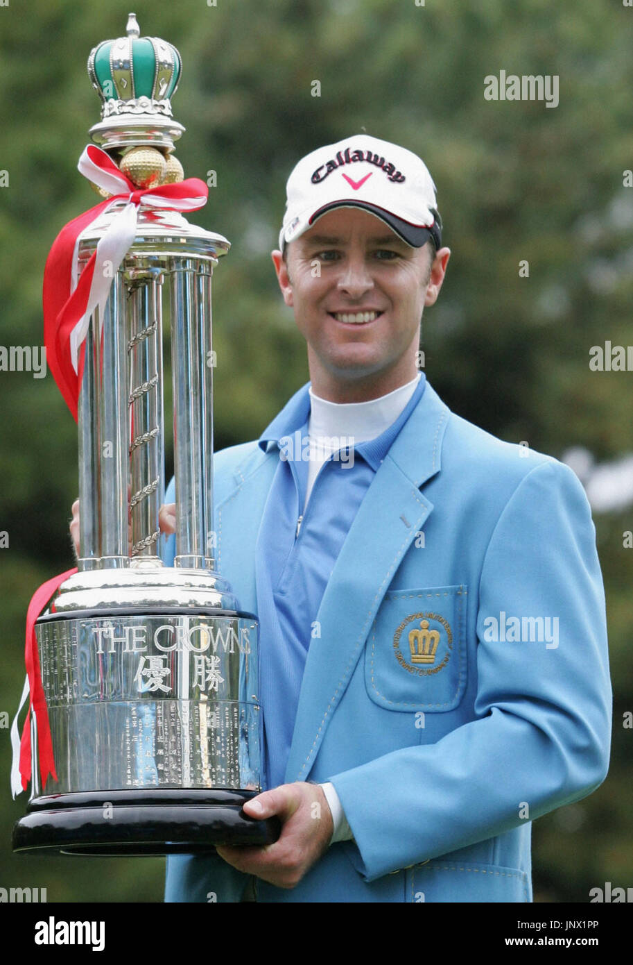TOGO, Japan - Australia's Brendan Jones holds the trophy as he picked ...