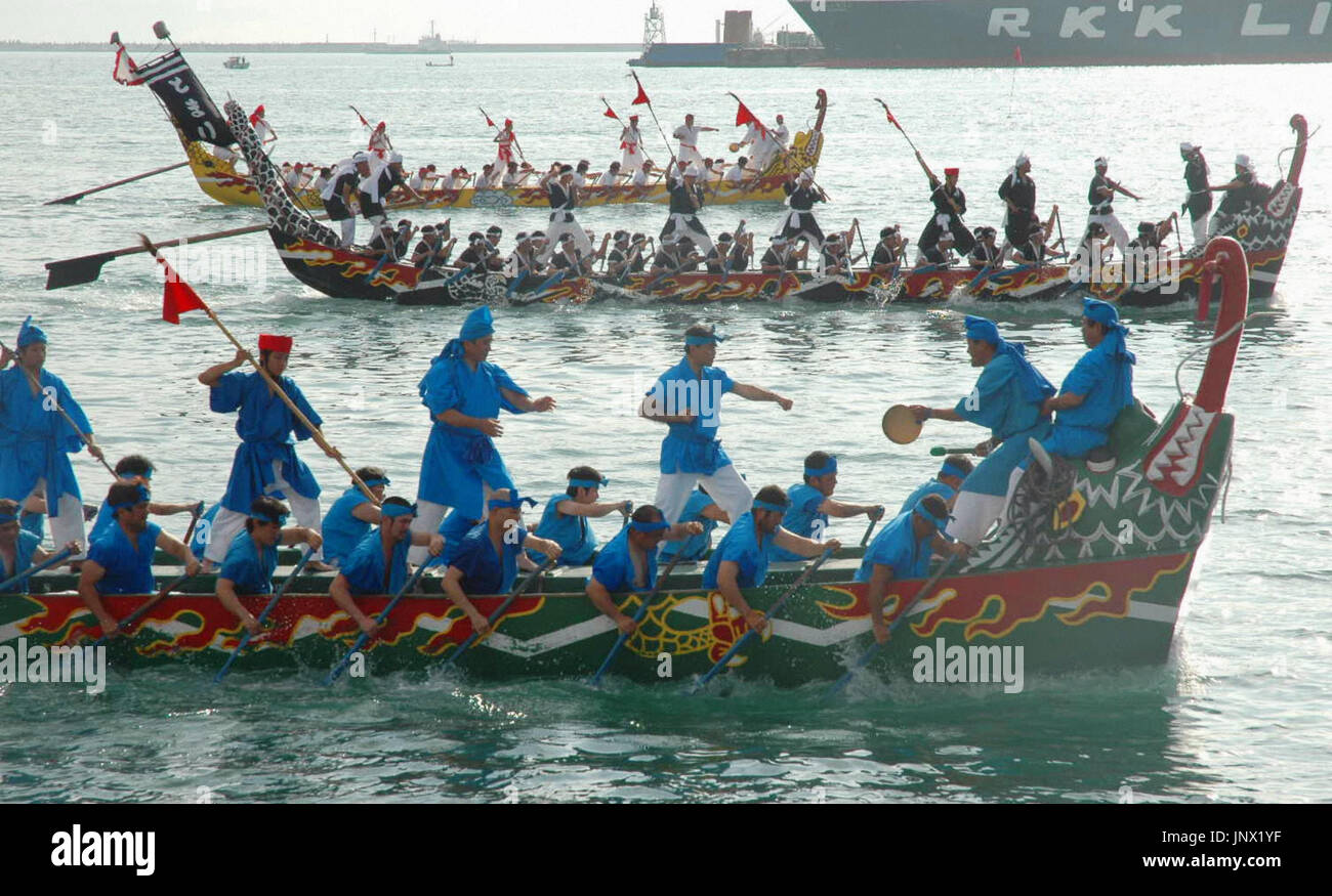NAHA, Japan - People compete in the annual traditional dragon boat race ...