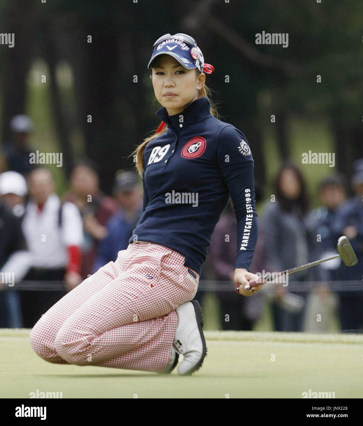 TSUKUBAMIRAI, Japan - CORRECTING DATE Momoko Ueda kneels down after ...