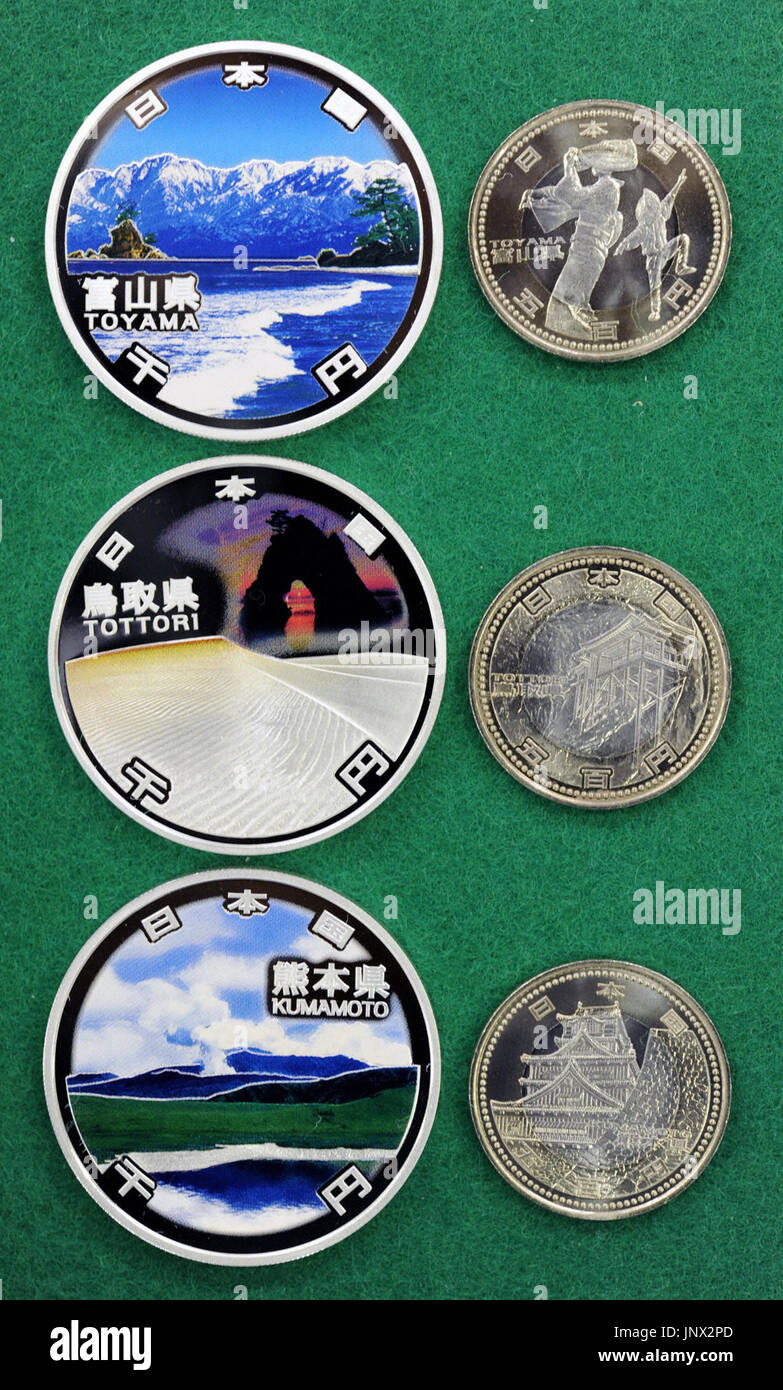 OSAKA, Japan - Photo shows three pairs of memorial coins depicting ...