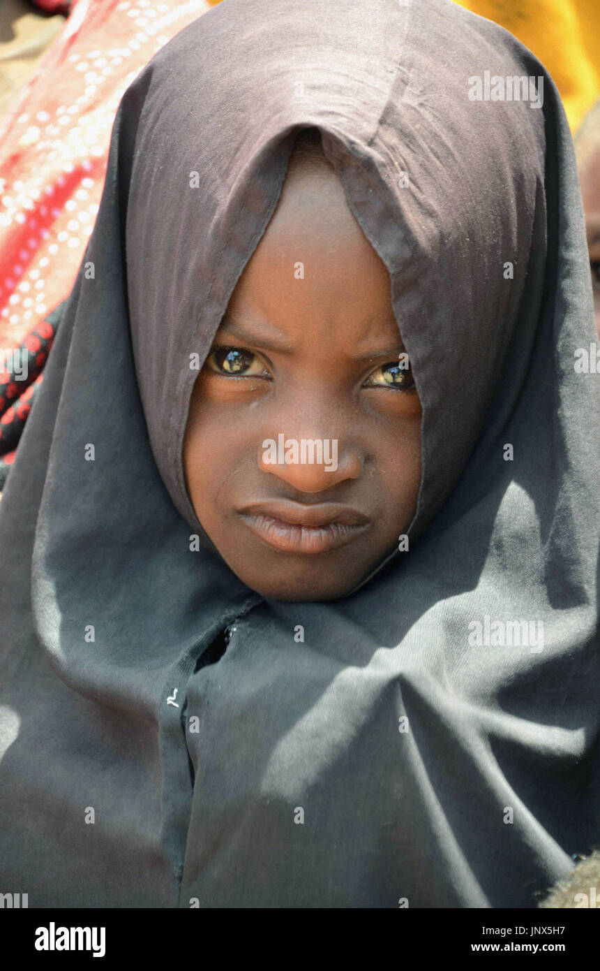 TOKYO, Japan - Photo taken on Aug. 12, 2011, shows a girl who fled from ...