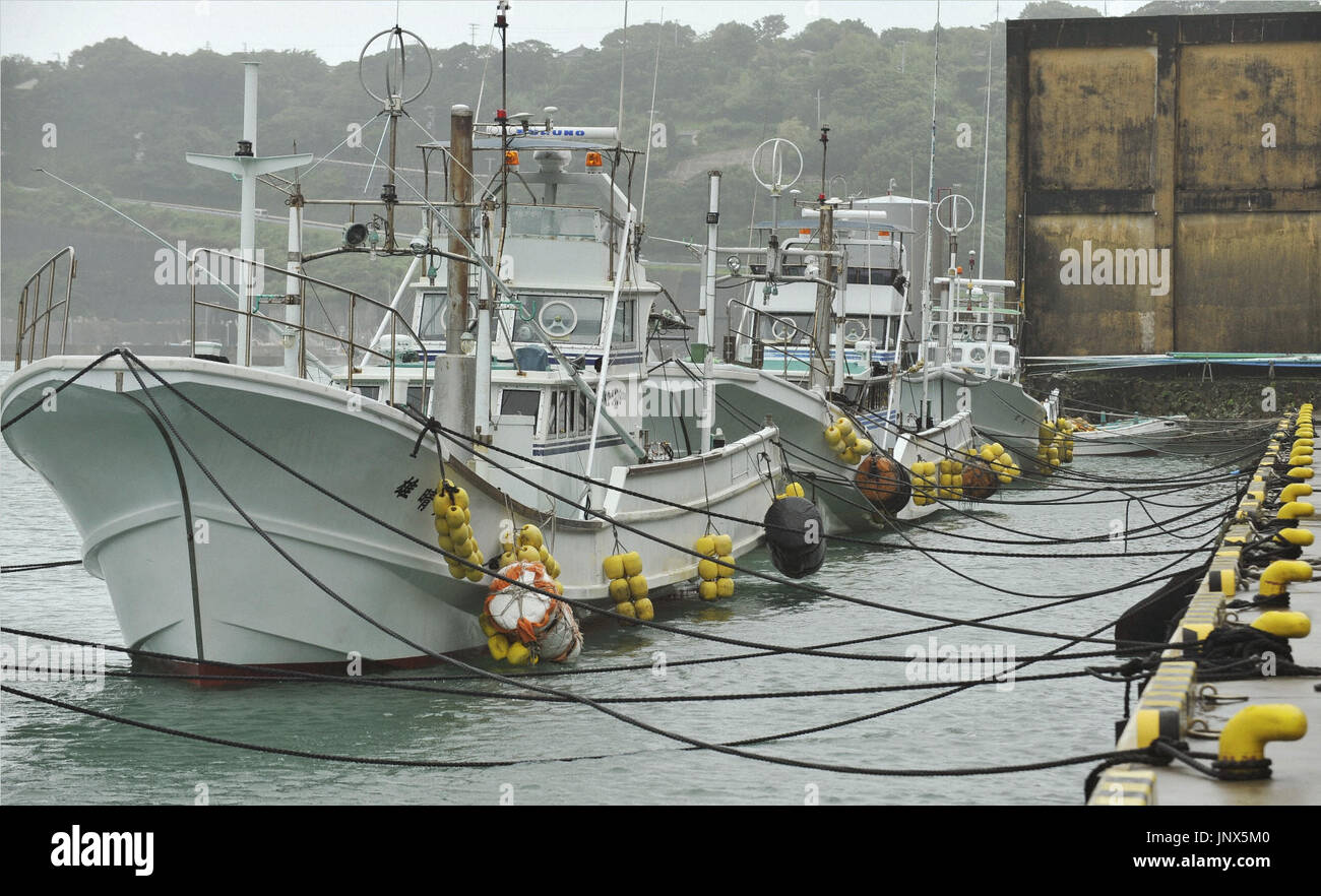 TAIJI, Japan - Fishing boats are tied up in the traditional whaling ...