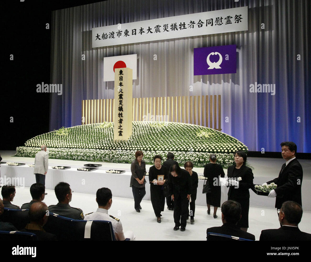 OFUNATO, Japan - People attend a memorial service for victims of the ...