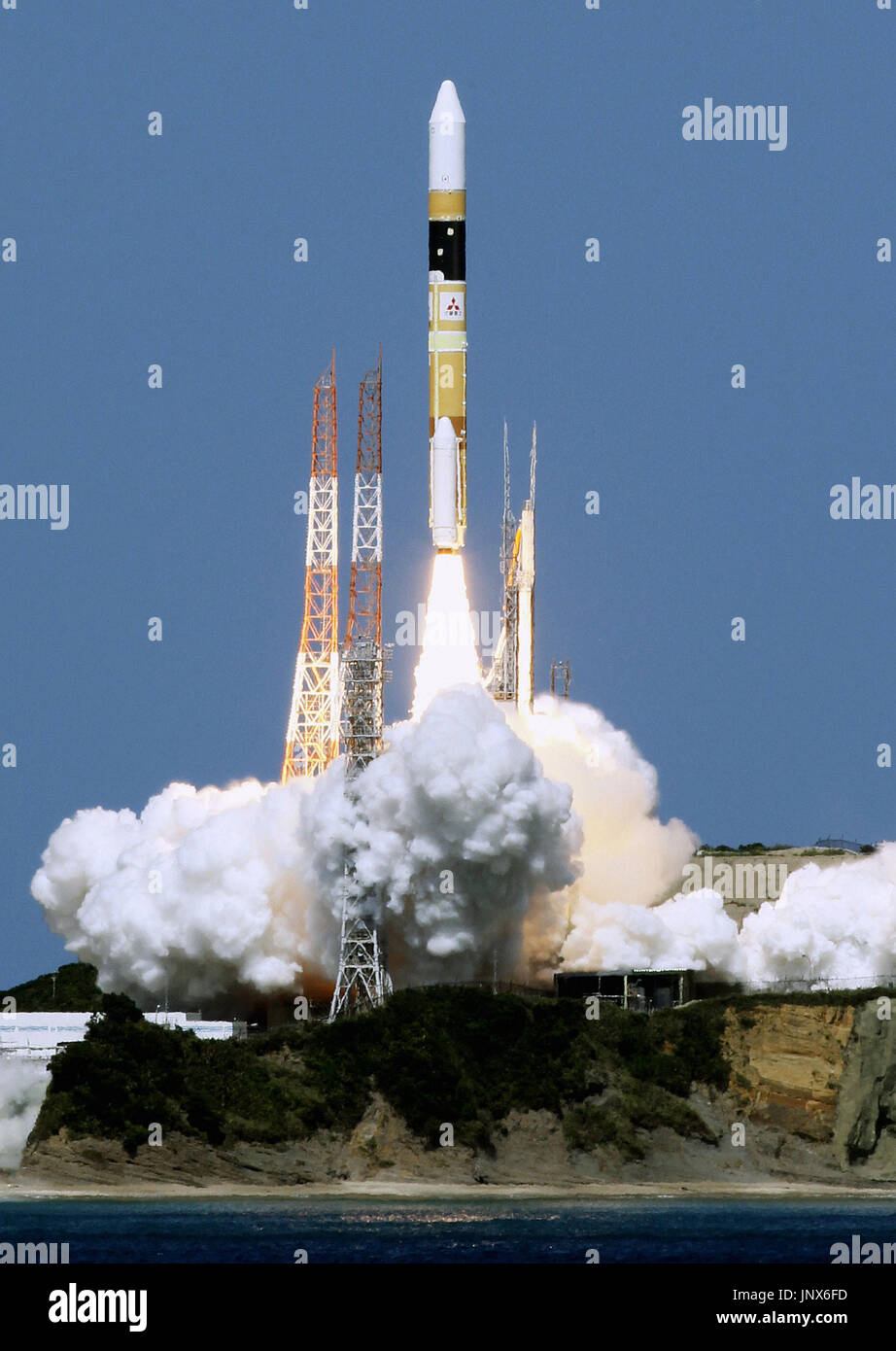 TANEGASHIMA, Japan - An H-2A rocket, carrying a Japanese information ...