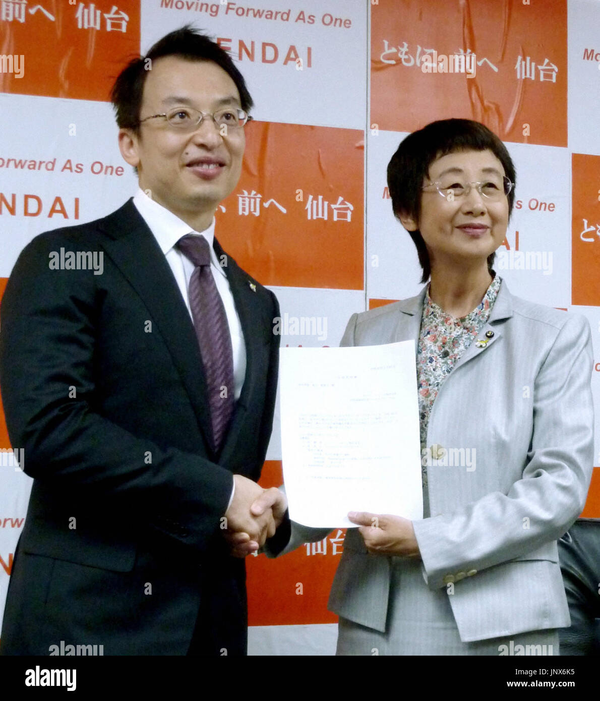 SENDAI, Japan - Jasper Cheung (L), president of Amazon Japan K.K ...