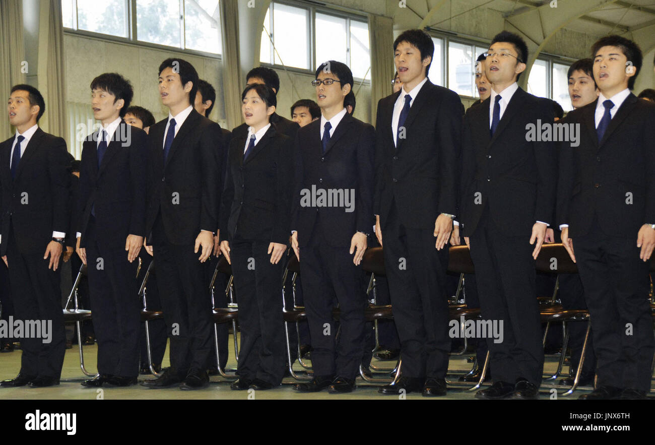 MIYAZAKI, Japan - New students sing the school song at an entrance ...