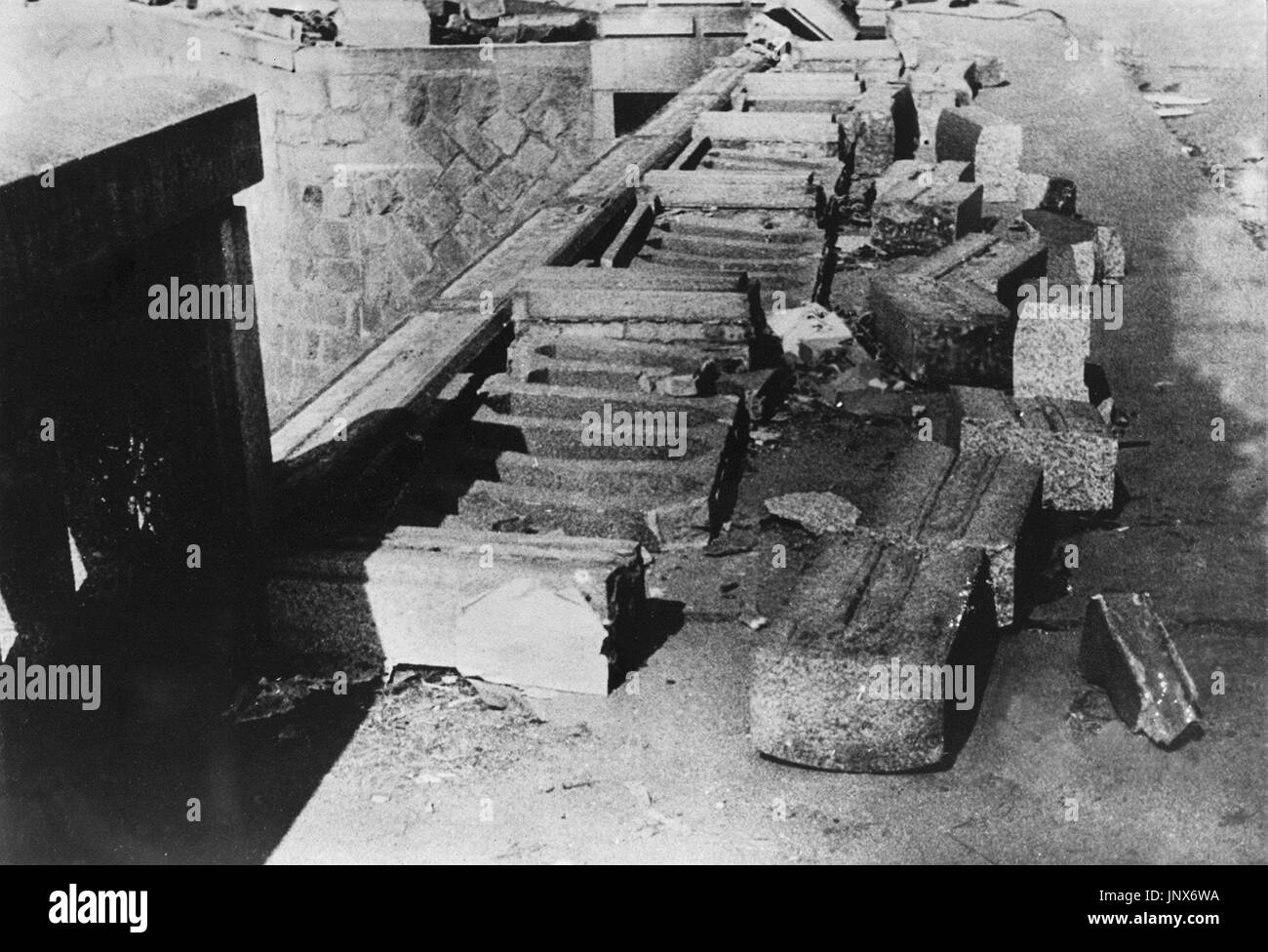 HIROSHIMA, Japan - This file photo shows a collapsed block fence ...