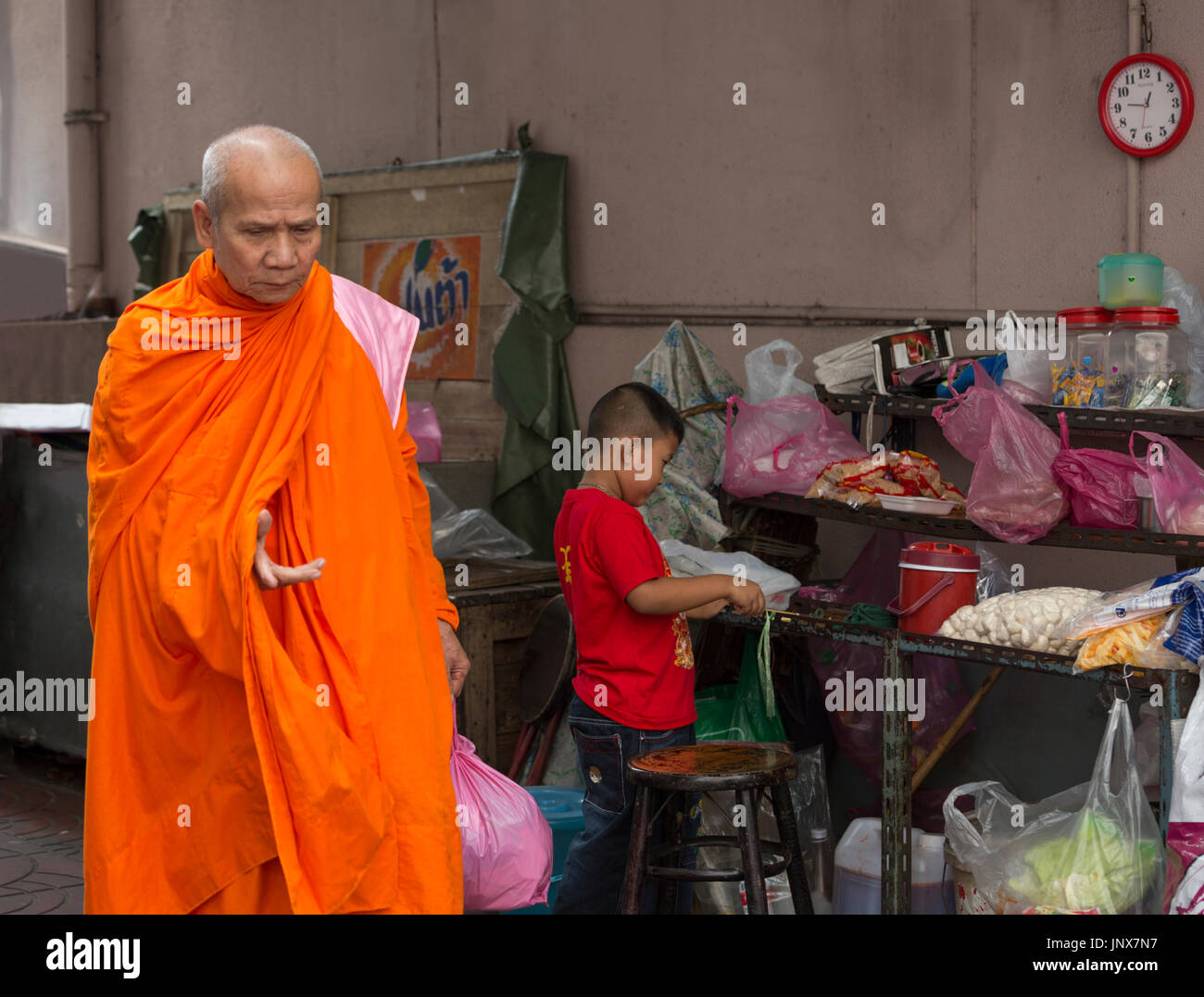 Saffron robe hi-res stock photography and images - Alamy