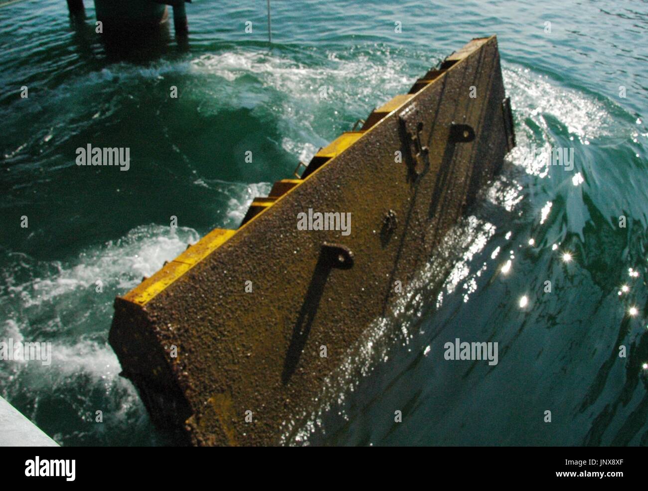 SHIZUOKA, Japan - An experimental remote-controlled breakwater rises ...