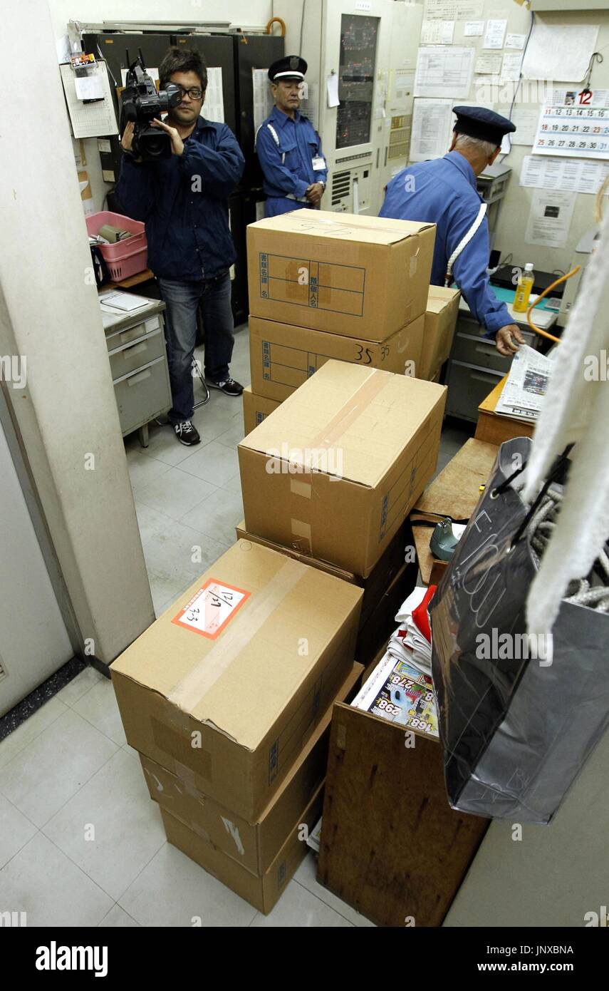 NAHA, Japan - Cardboard boxes containing a key environmental impact ...