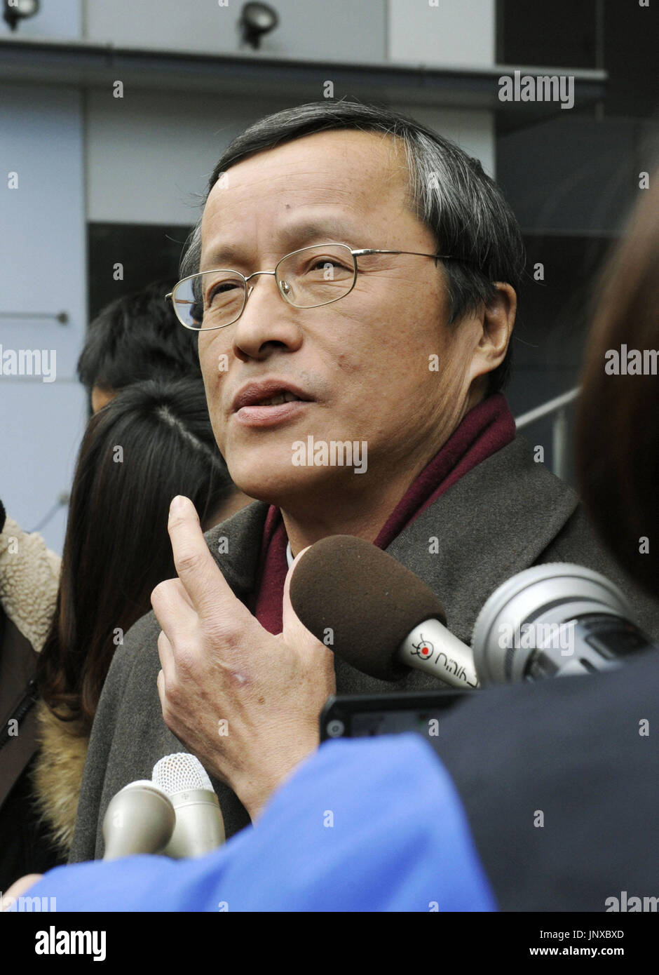TOKYO, Japan - Lawyer Taro Takimoto speaks to reporters in Tokyo on Jan ...