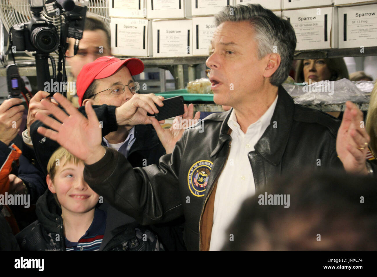 NASHUA, United States - Former Utah Gov. Jon Huntsman is surrounded by ...