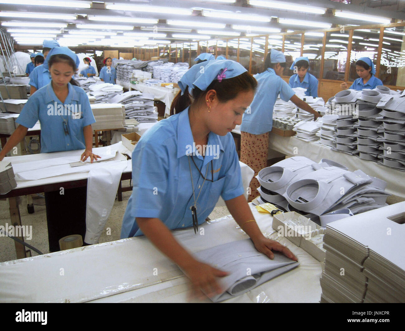 YANGON, Myanmar - Women work at a Japanese garment factory in ...