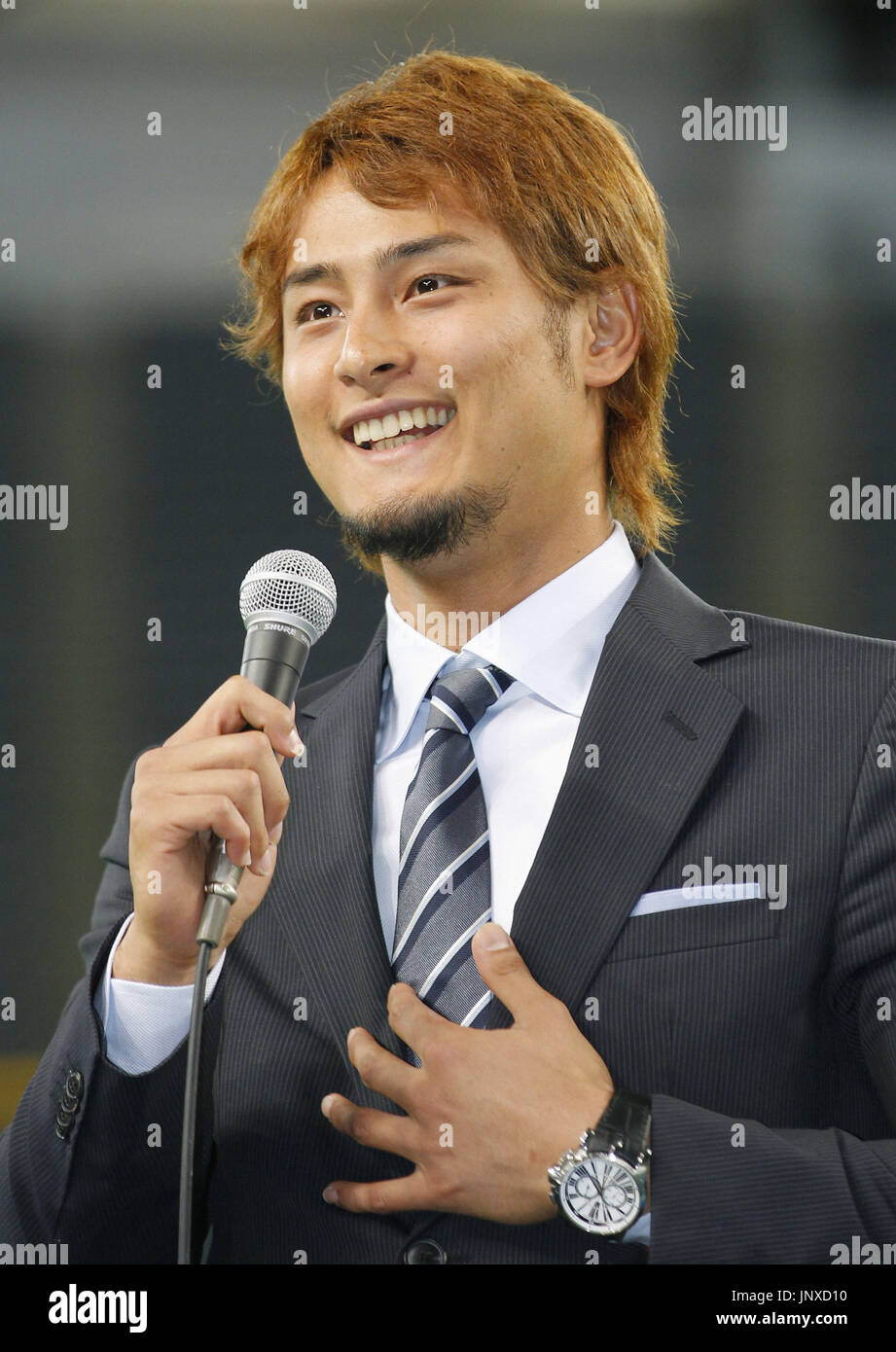 SAPPORO, Japan - Japanese pitcher Yu Darvish who has signed a six-year ...