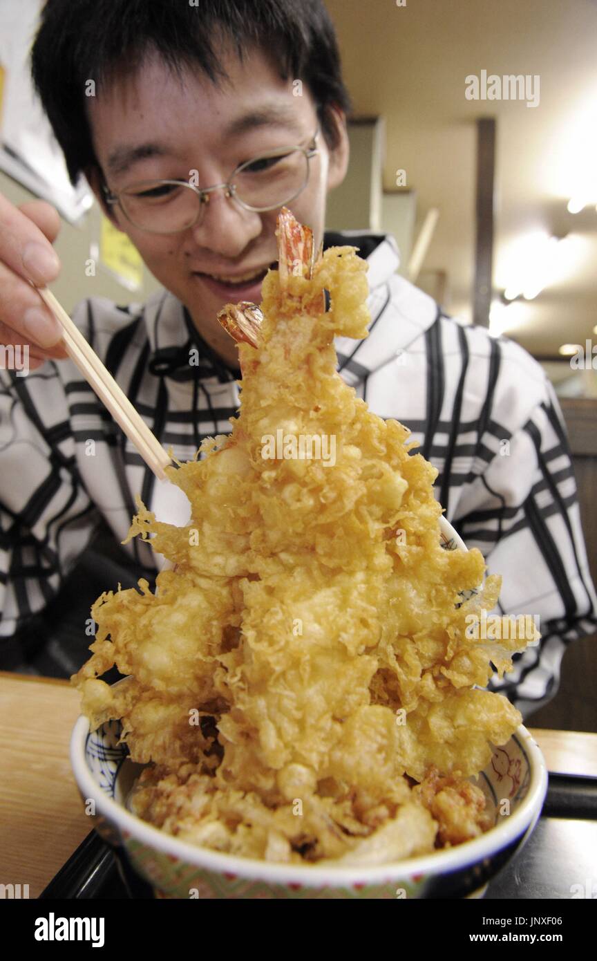 TOKYO, Japan - Yasuhiro Morimoto smiles in front of a dish resembling ...
