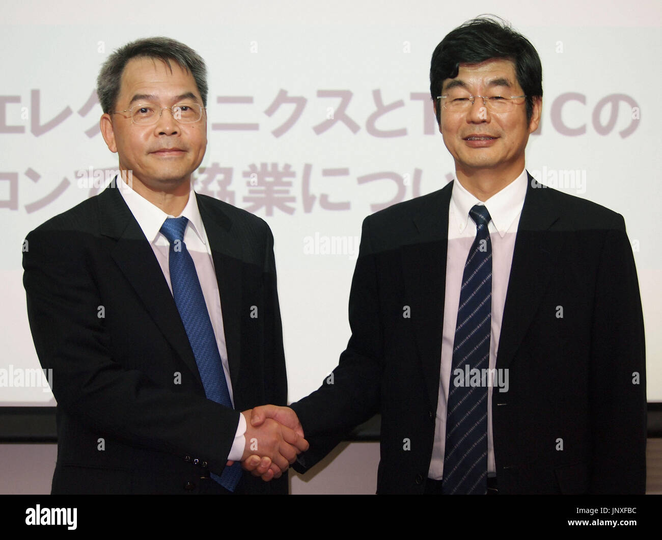 TOKYO, Japan - Shinichi Iwamoto (R), senior vice president of Japanese ...