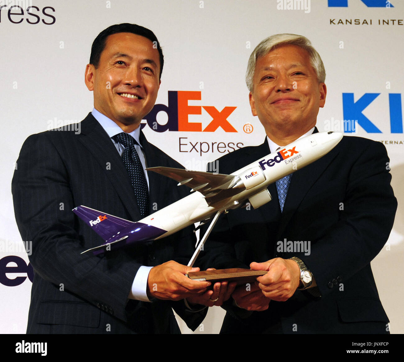 OSAKA, Japan - Masamichi Ujiie (L), FedEx Corp.'s vice president for ...