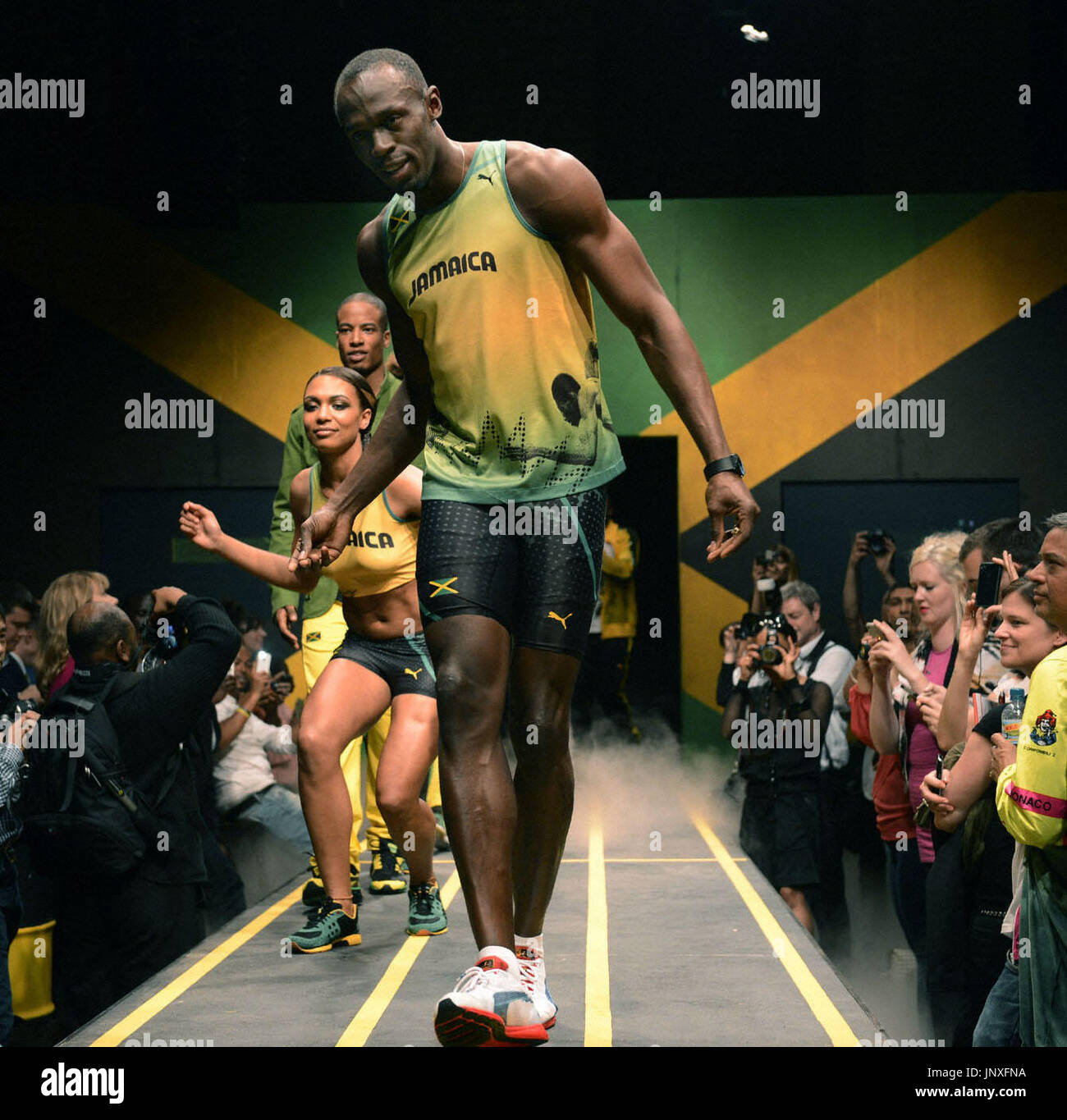 LONDON, Britain - Jamaican sprinter Usain Bolt (C front), three-time ...