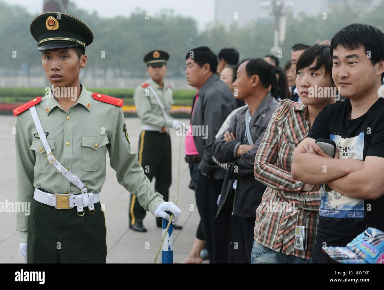 BEIJING, China - Police officers keep guard at Beijing's Tiananmen ...