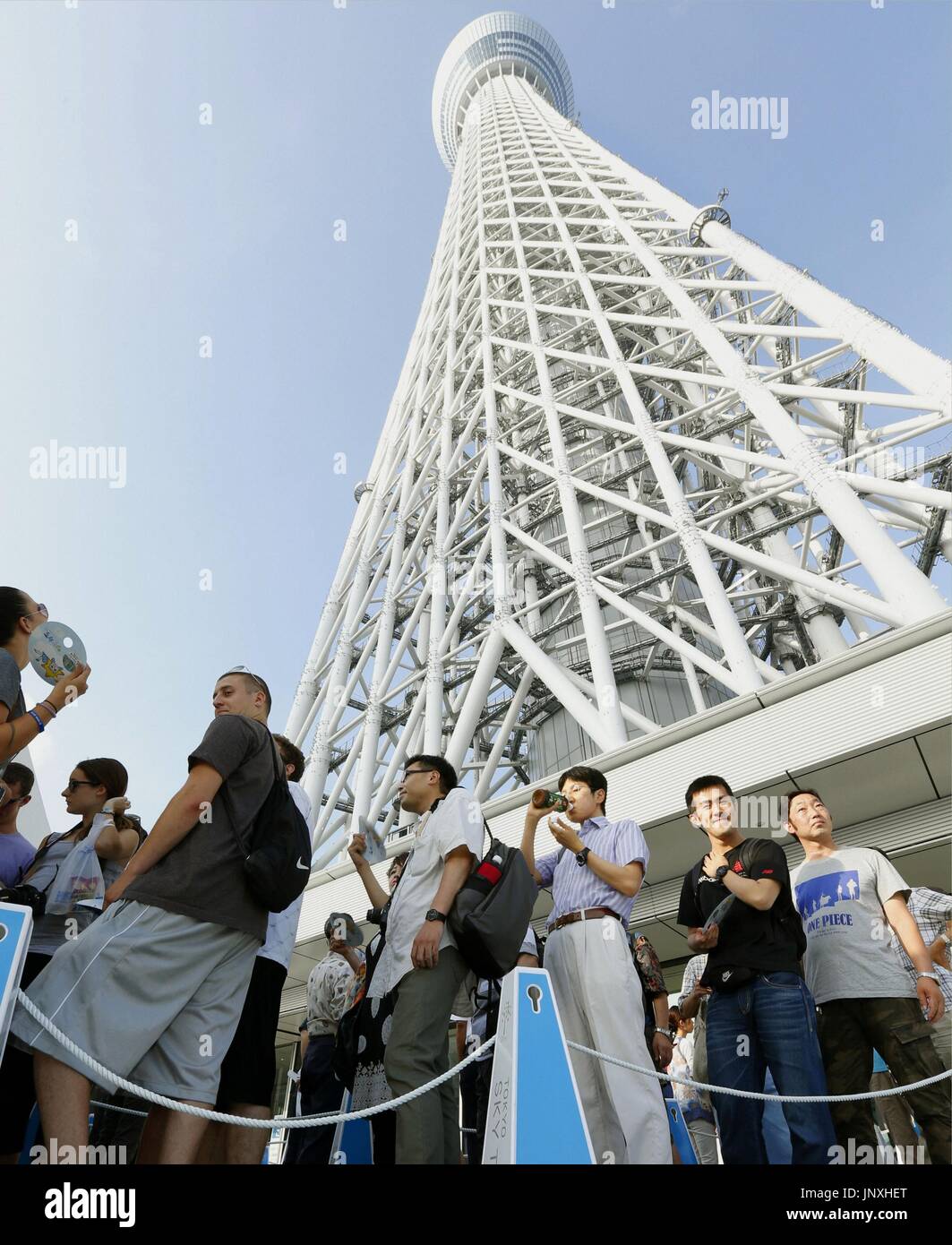 TOKYO, Japan - Visitors line up as the operator of Tokyo Skytree in the ...