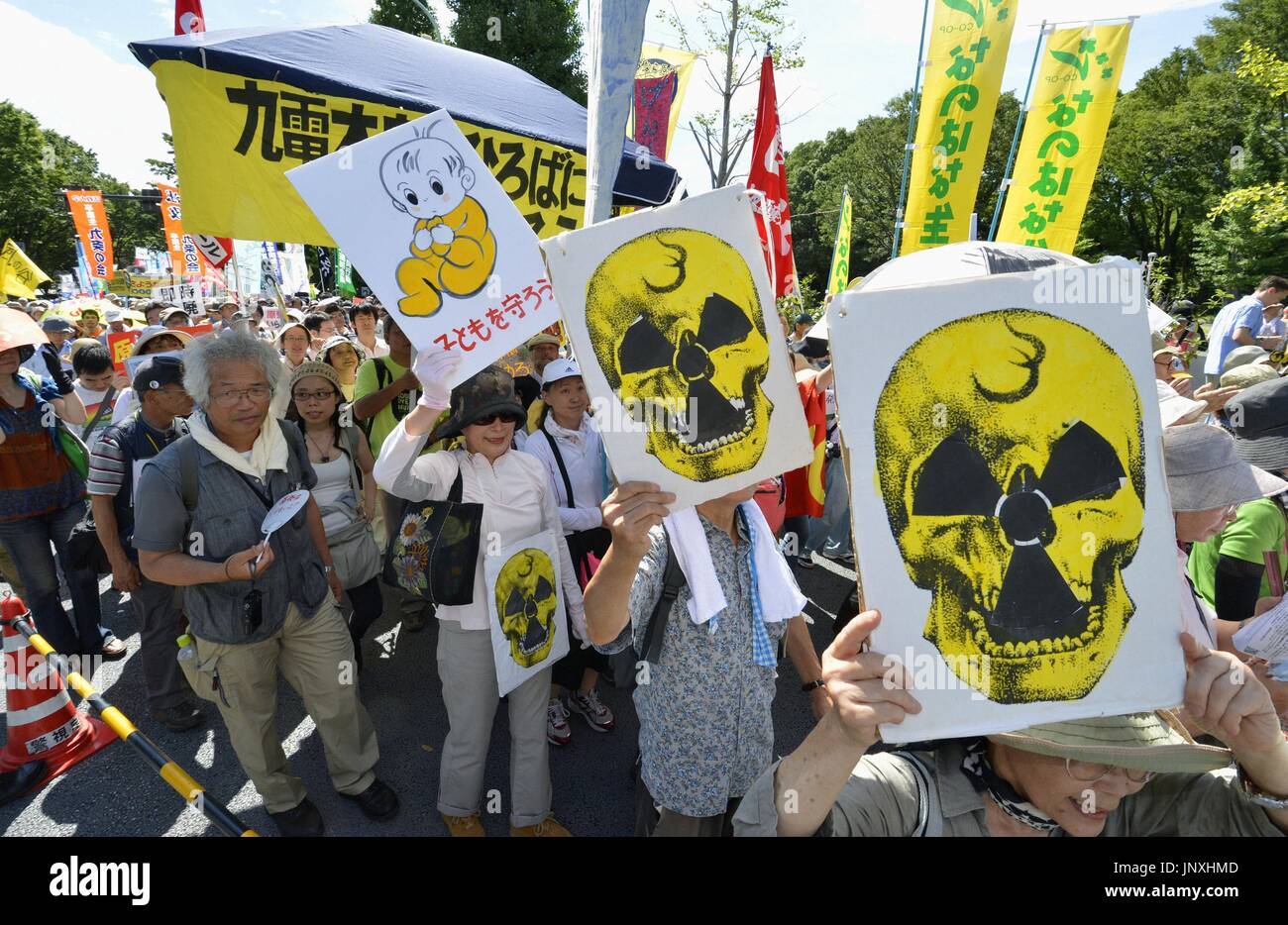 TOKYO, Japan - People parade in an anti-nuclear power plant rally in ...