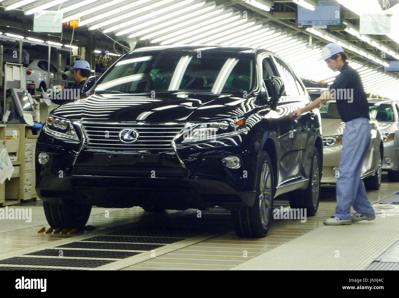 NAGOYA, Japan - RX sport utility vehicles of Toyota Motor Corp.'s Lexus ...