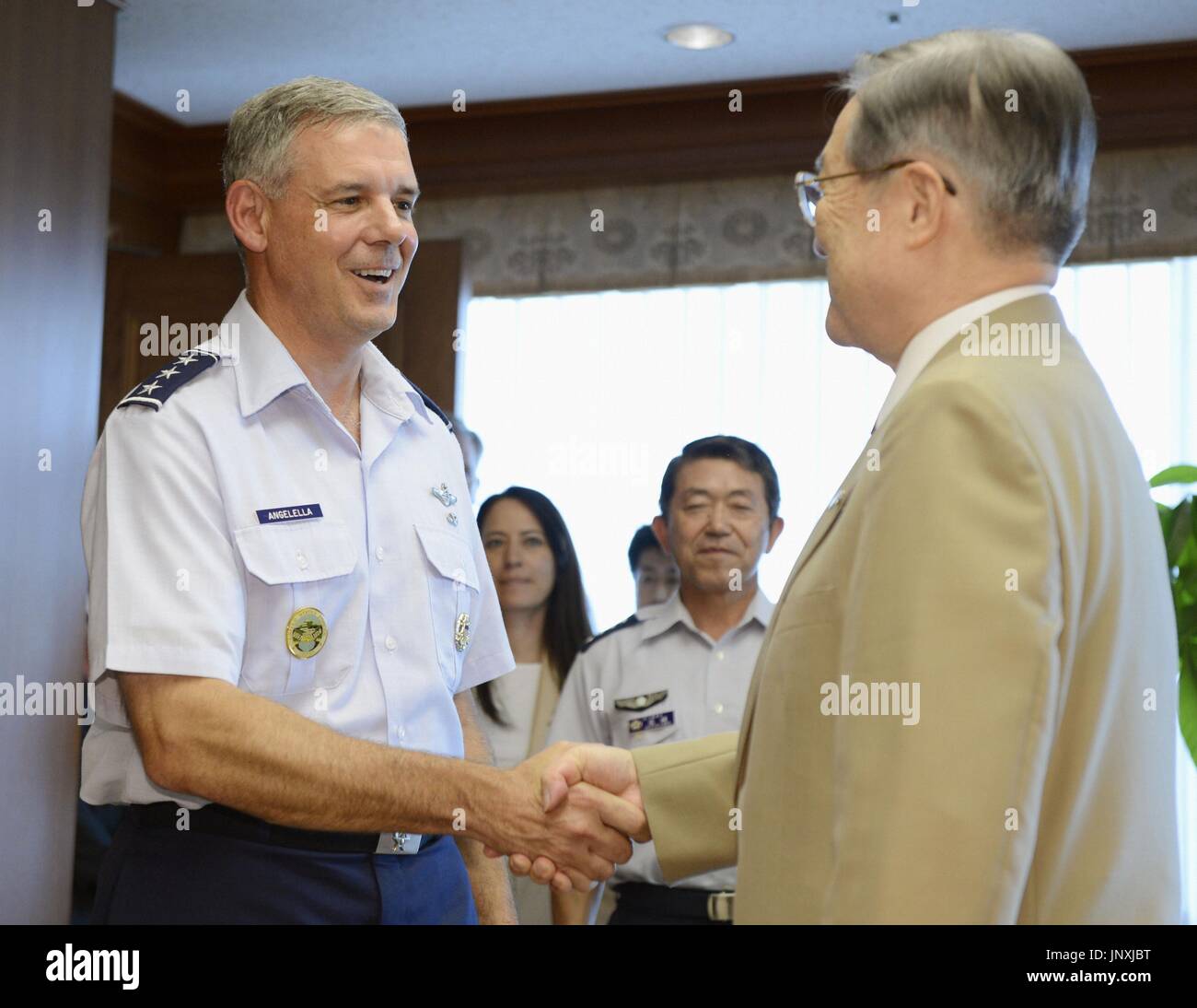 TOKYO, Japan - Japanese Defense Minister Satoshi Morimoto (R) and Lt ...