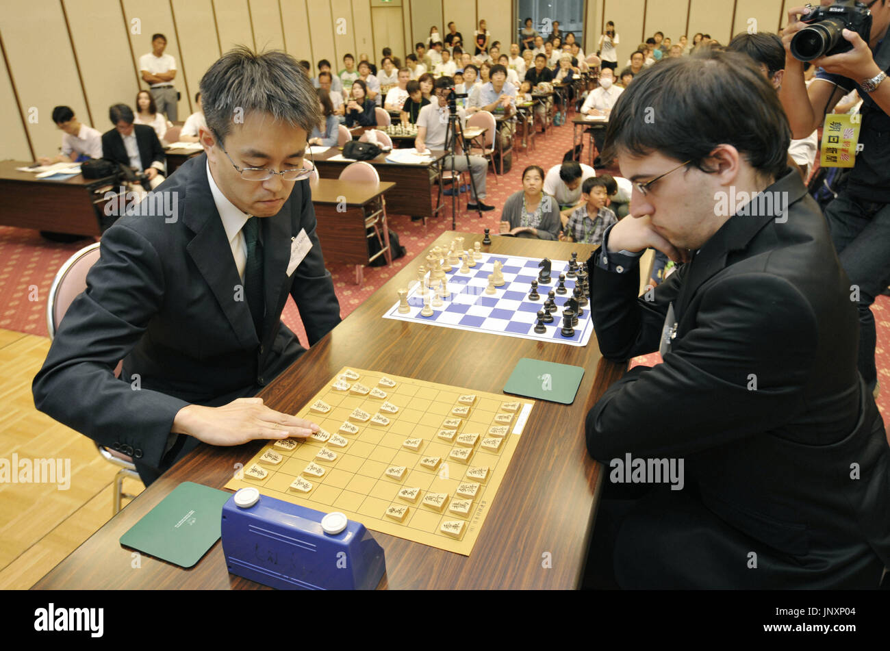 KOBE, Japan - Japanese shogi master Yoshiharu Habu (L) and French chess ...