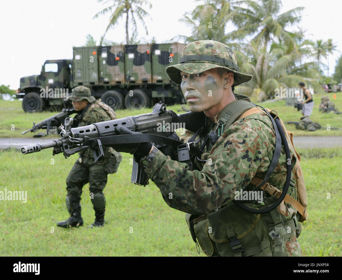 GUAM, United States - Photo shows members of Japan's Ground Self ...