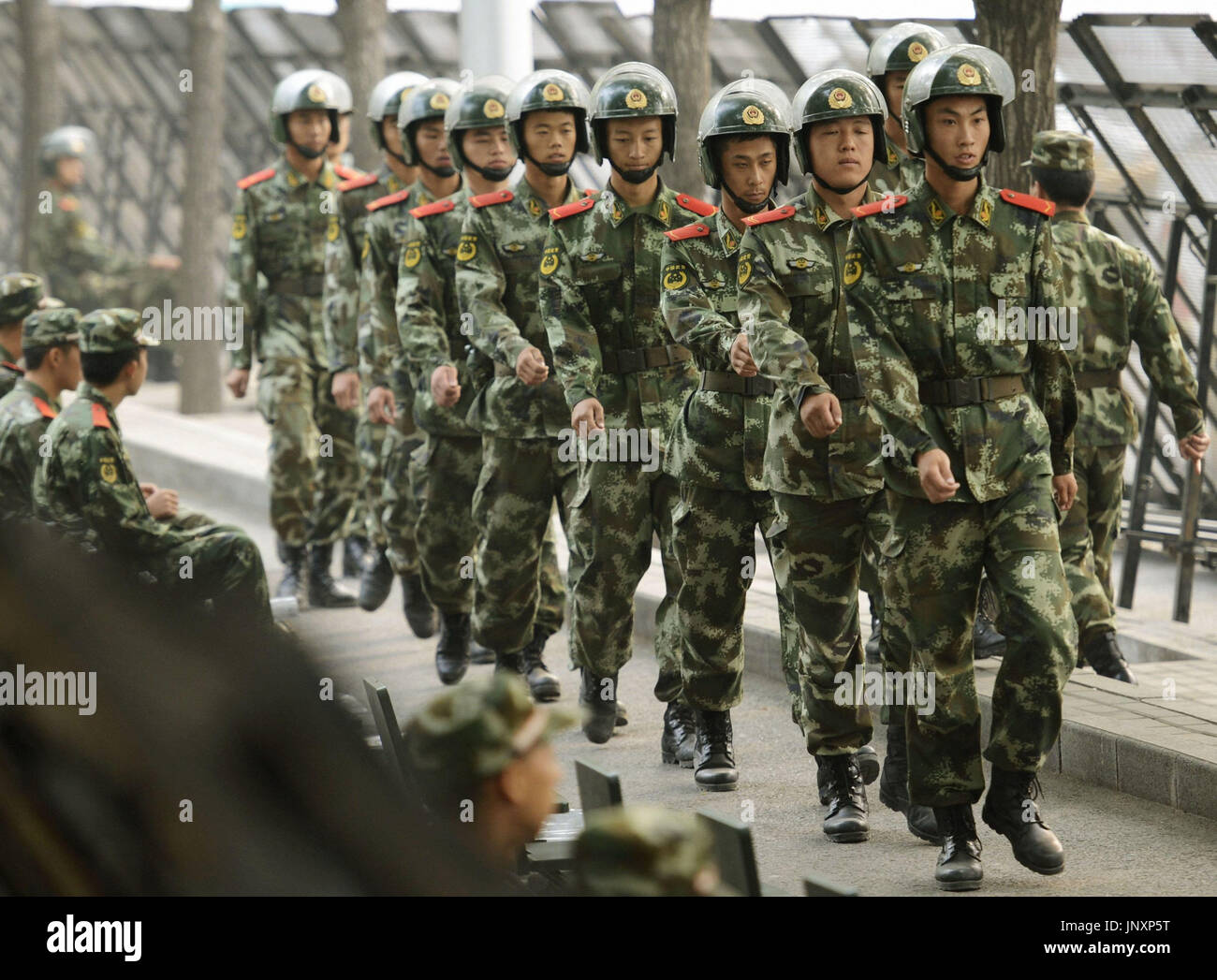 BEIJING, China - Armed police officers guard the Japanese Embassy in ...