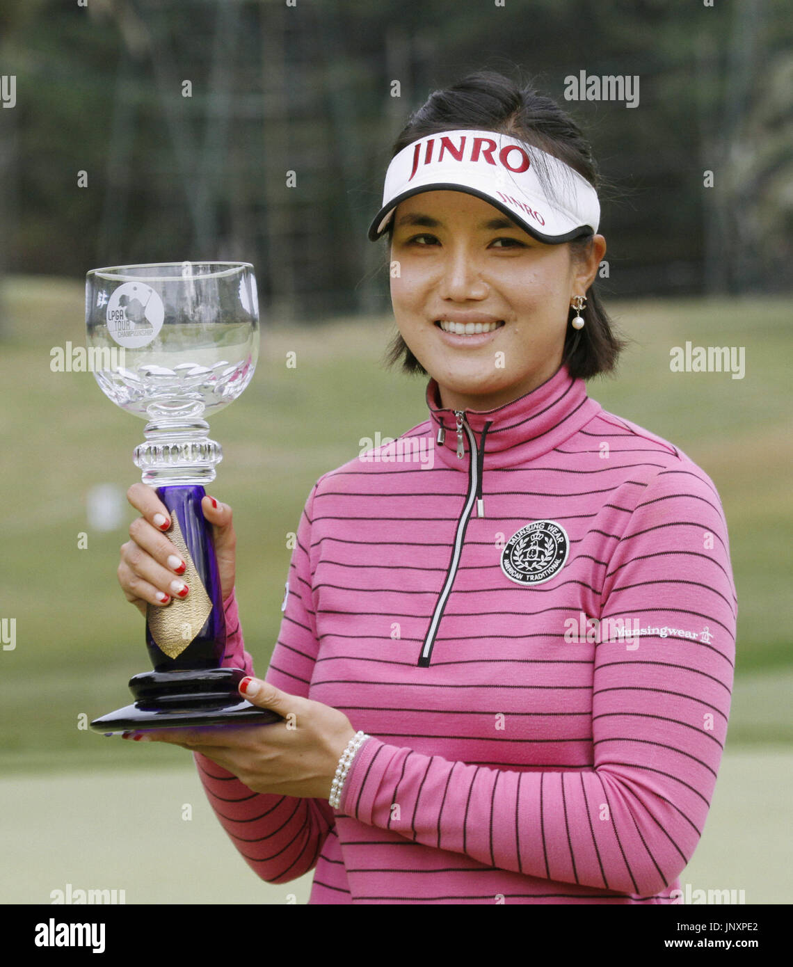 MIYAZAKI, Japan - South Korea's Jeon Mi Jeong holds the winner's trophy ...