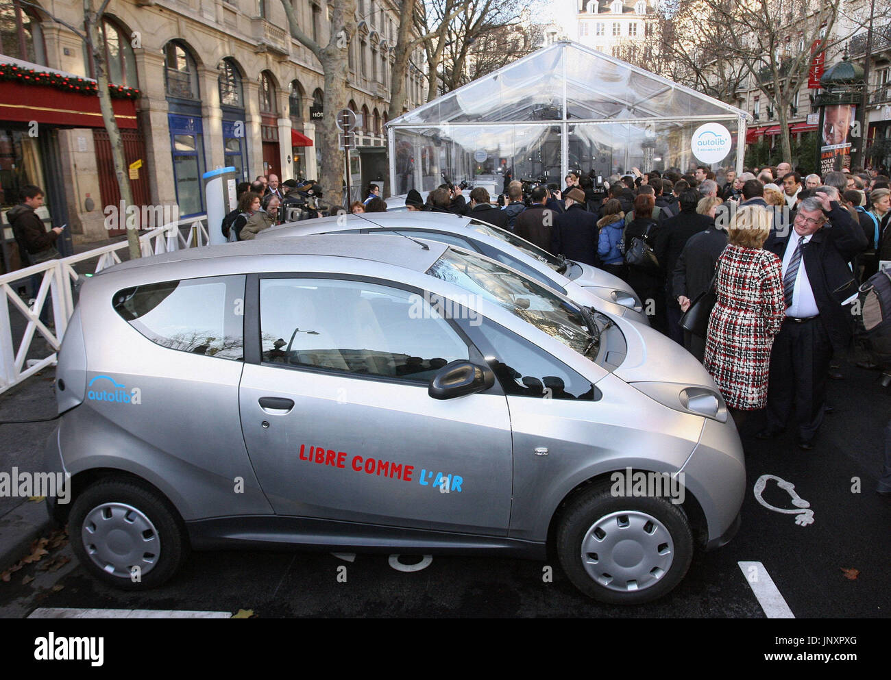 PARIS, France - Electric vehicles are shown at a ceremony in Paris on ...