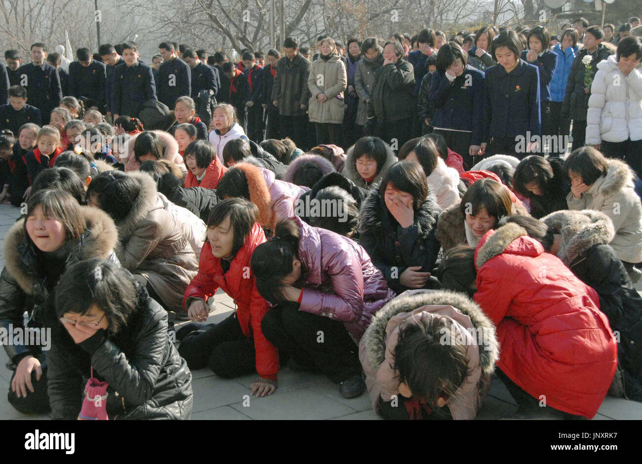 PYONGYANG, North Korea - Citizens in Pyongyang react on Dec. 19, 2011 ...
