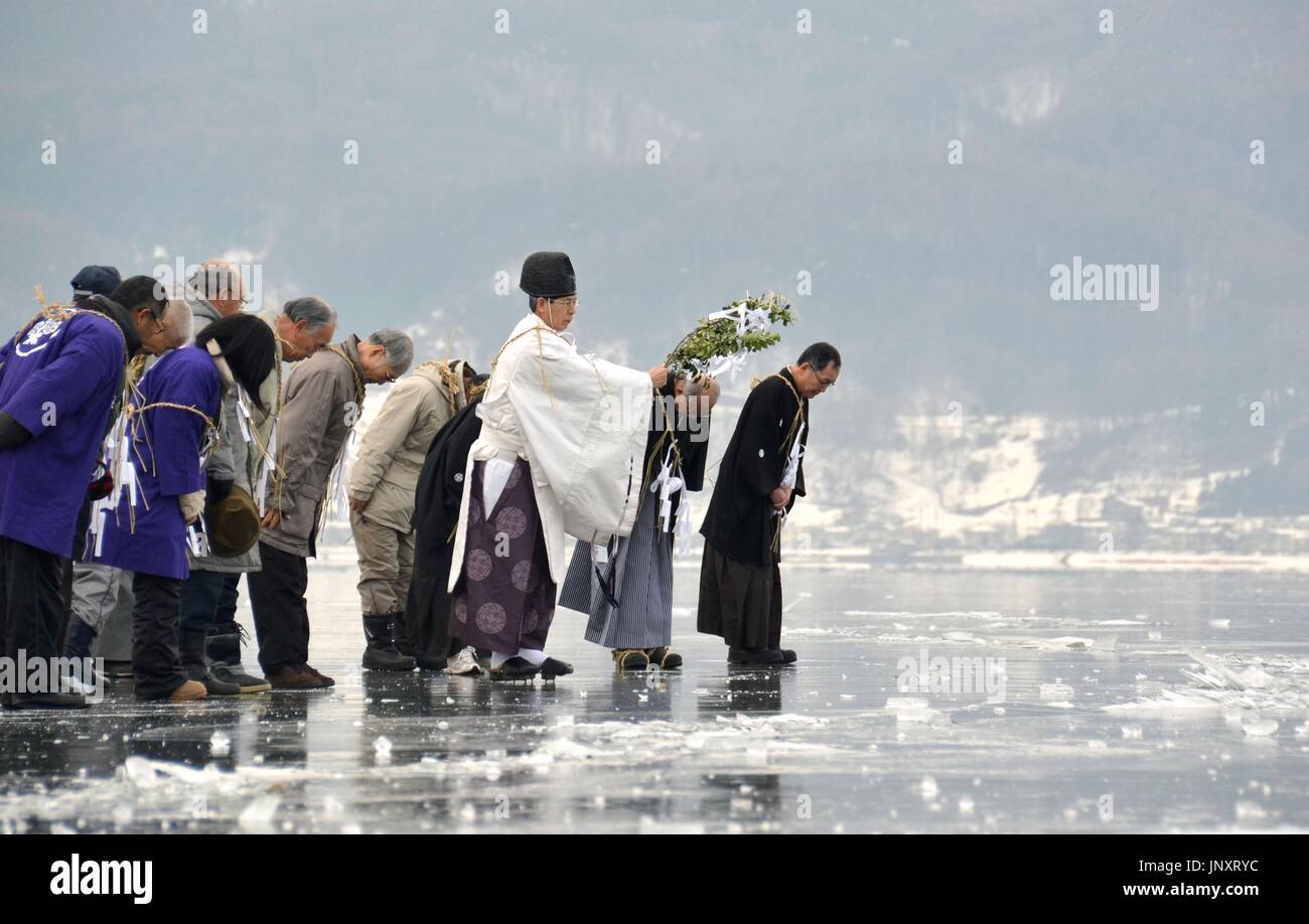 NAGANO, Japan - A Shinto ritual is held on the surface of the frozen ...